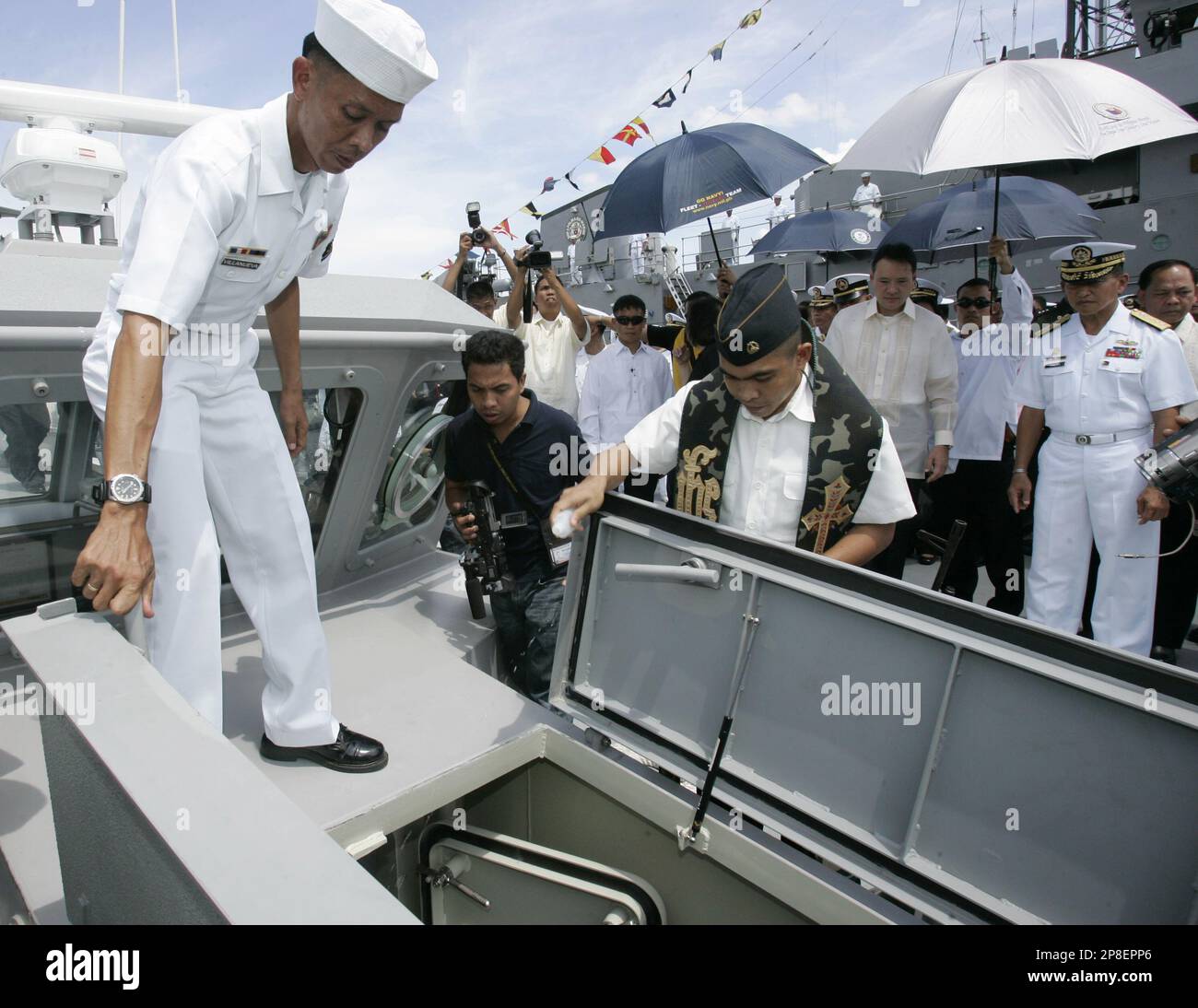 Philippine Navy Chief Vice-Admiral Ferdinand Golez, second from right ...