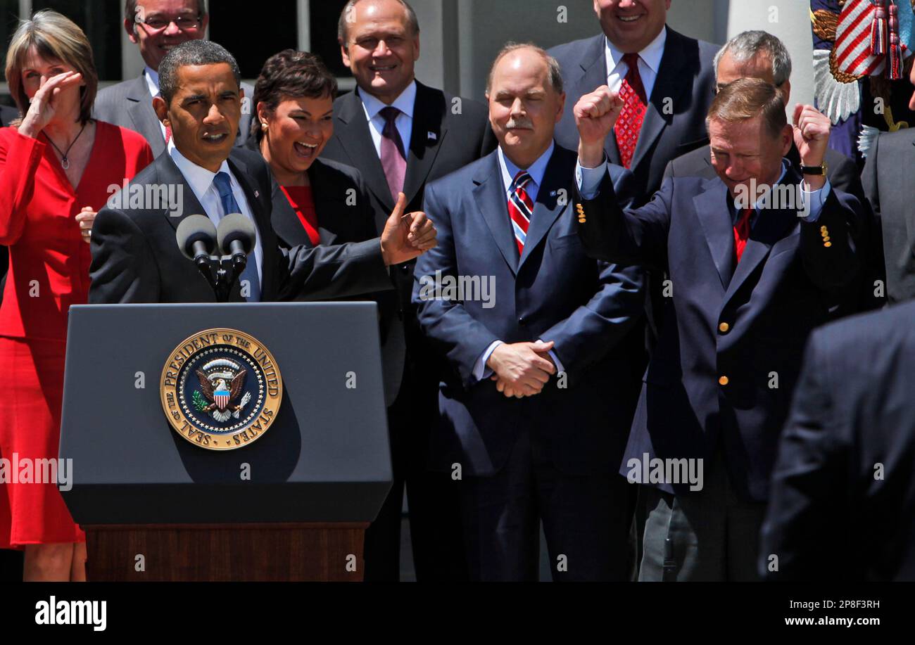 President Barack Obama, left, gets a reaction from Ford Chief Executive ...