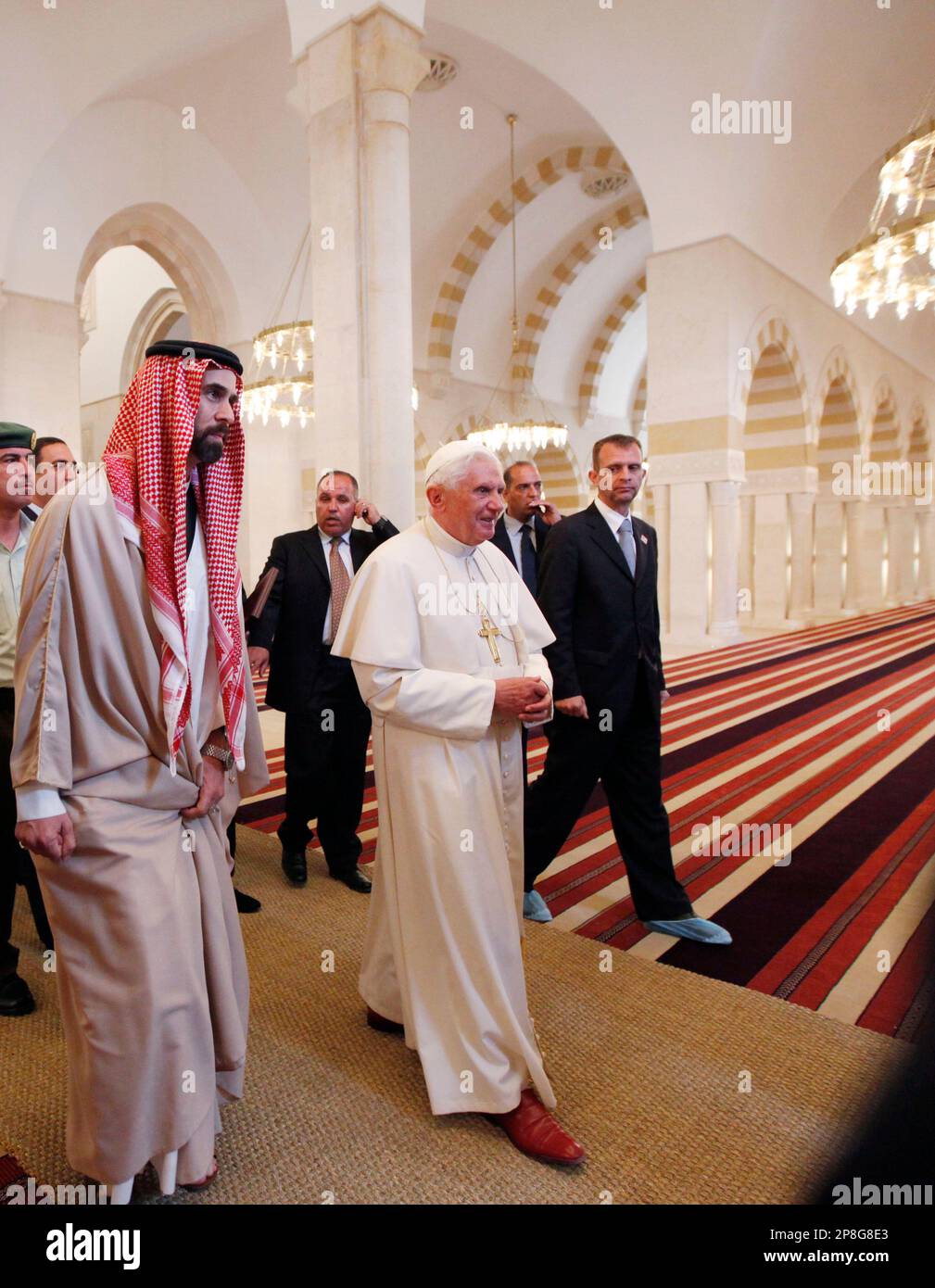 Prince Ghazi bin Mohammed, left, guides Pope Benedict XVI a tour of ...