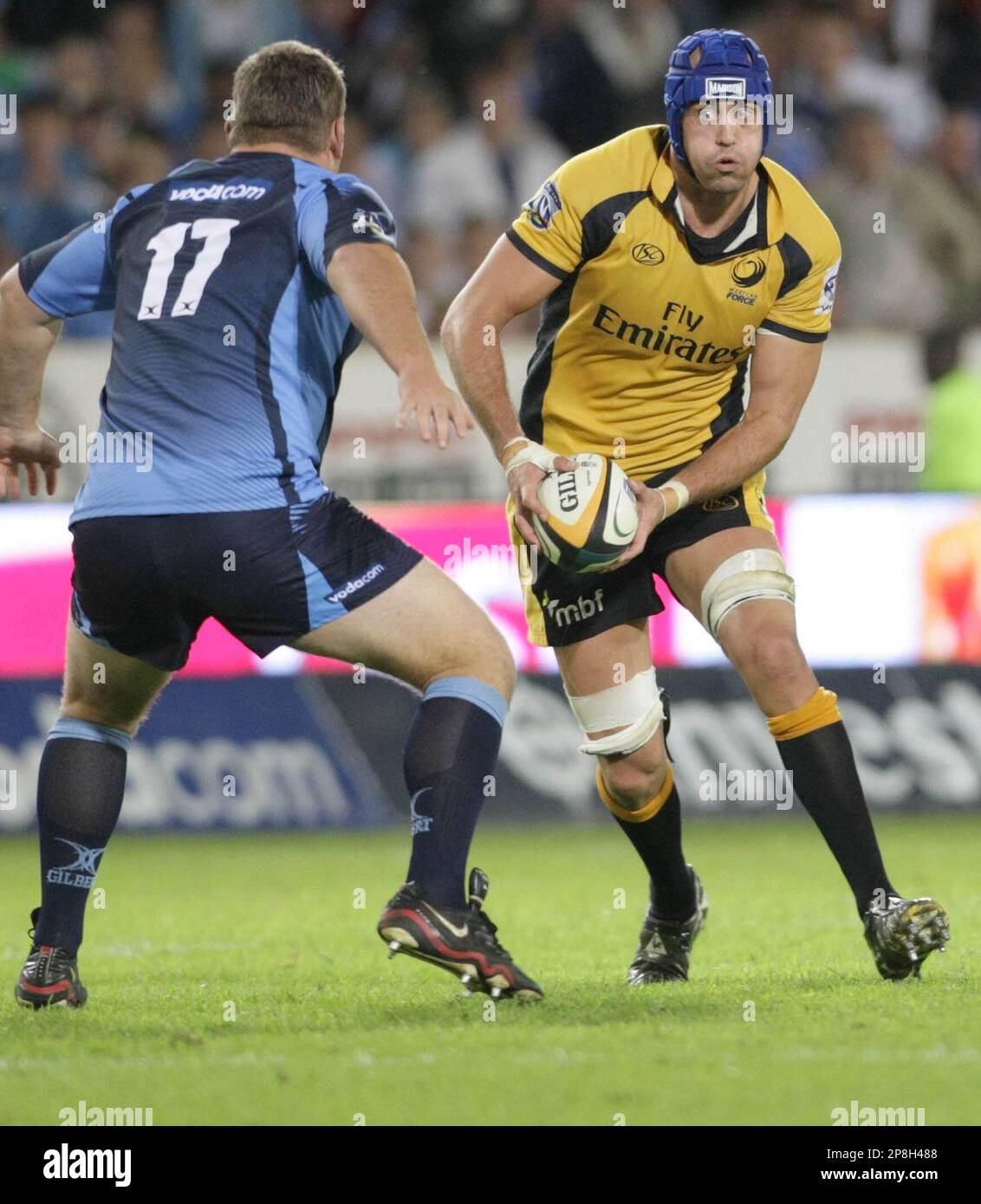 Australia's Western Force's Nathan Sharpe, right, gains possession of ...