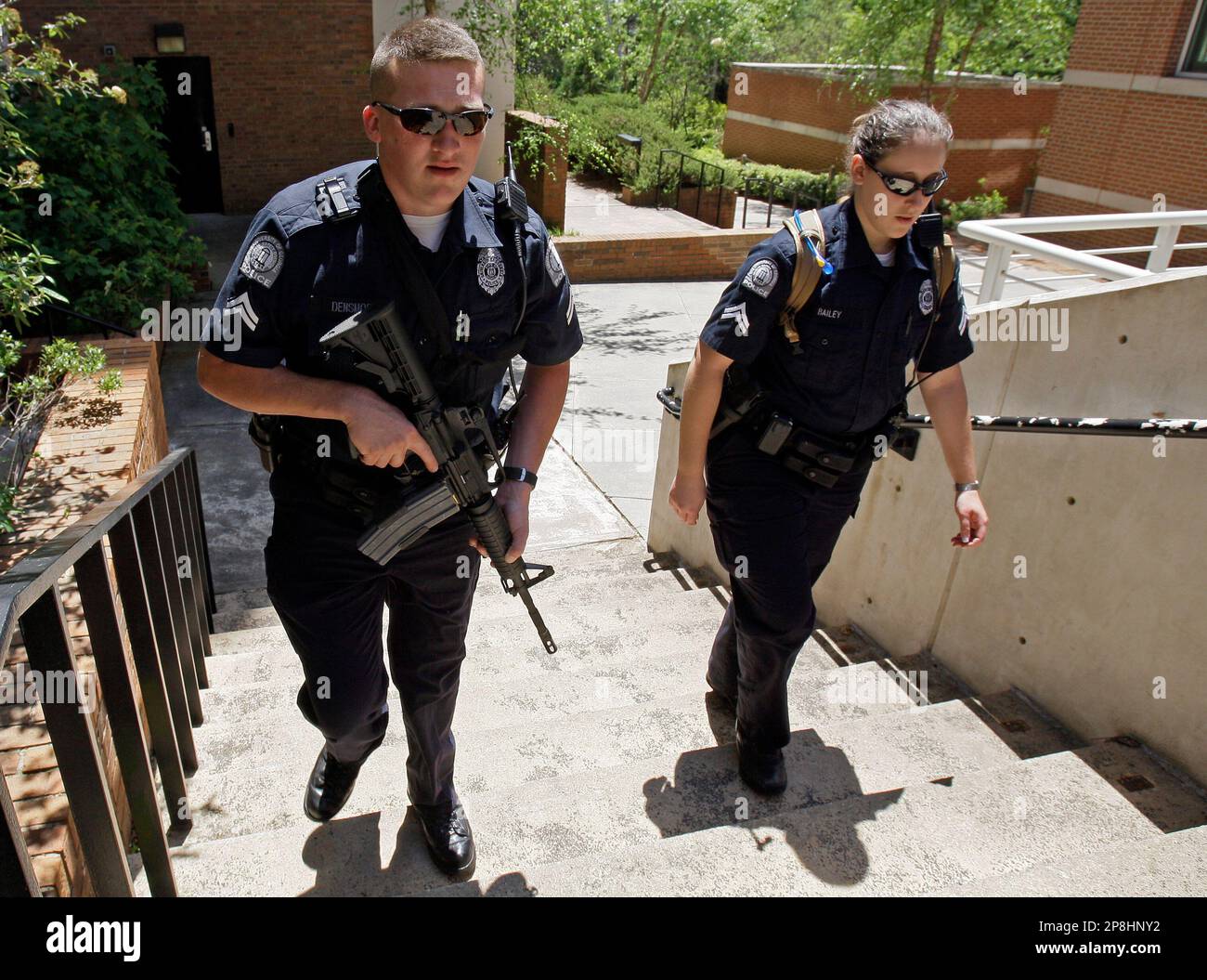 Armed University of Georgia Police officers patrol the campus Monday ...