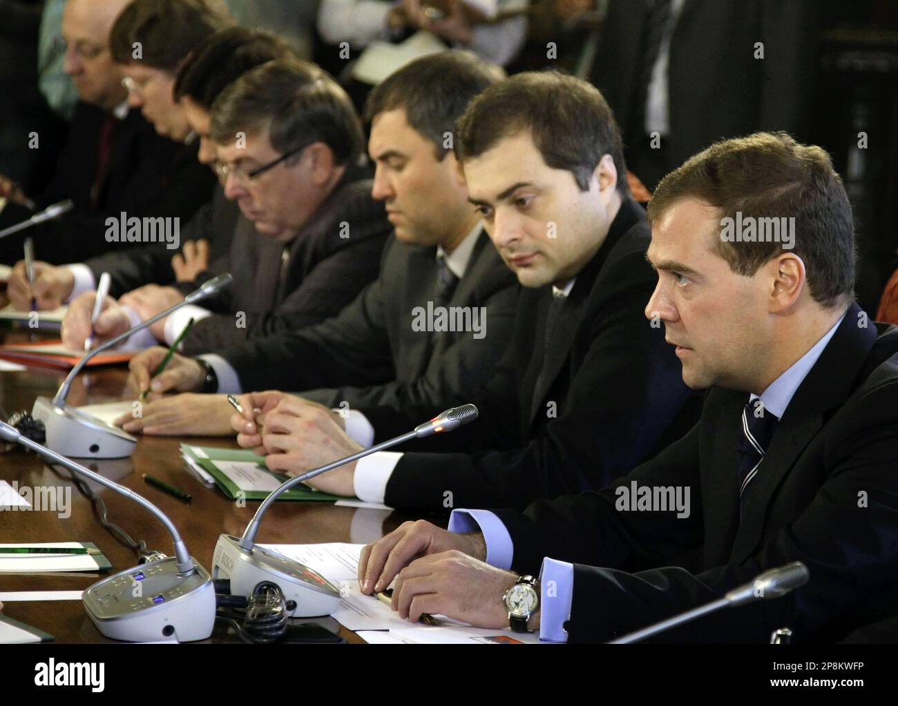Russian President Dmitry Medvedev, right, flanked by the Kremlin's First Deputy Chief of Staff ...