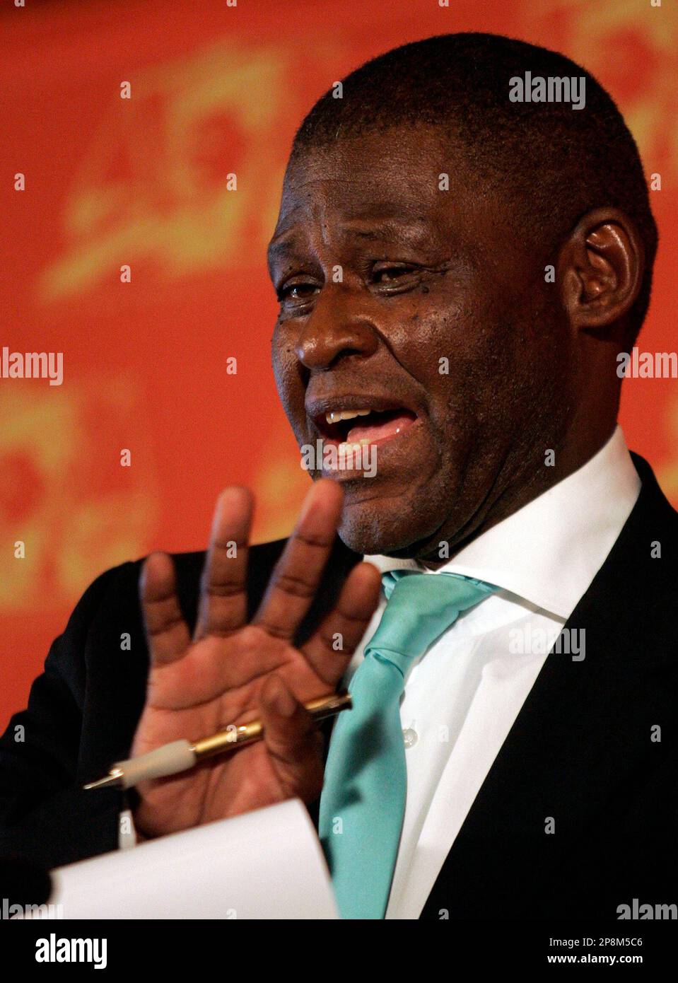 Mokotedi Mpshe, acting director of public prosecutions, reads a ...