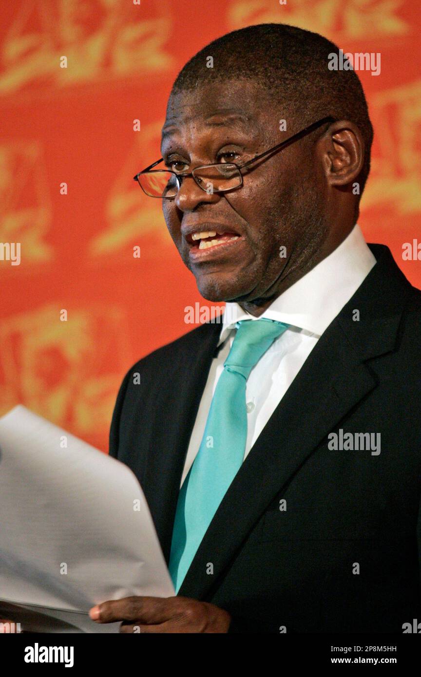Mokotedi Mpshe, acting director of public prosecutions reads a ...