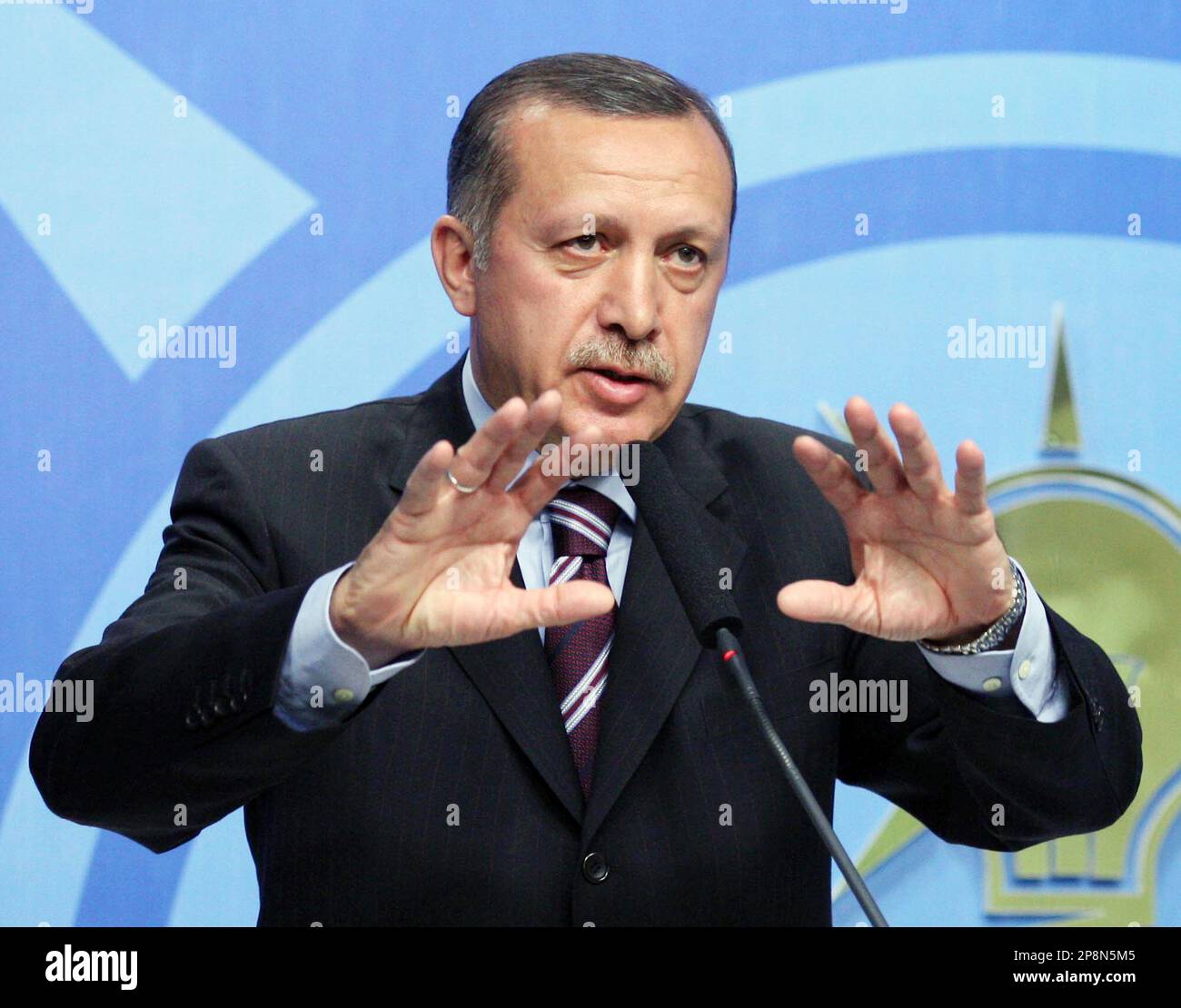 Turkey's Prime Minister Recep Tayyip Erdogan addresses the media at the ...