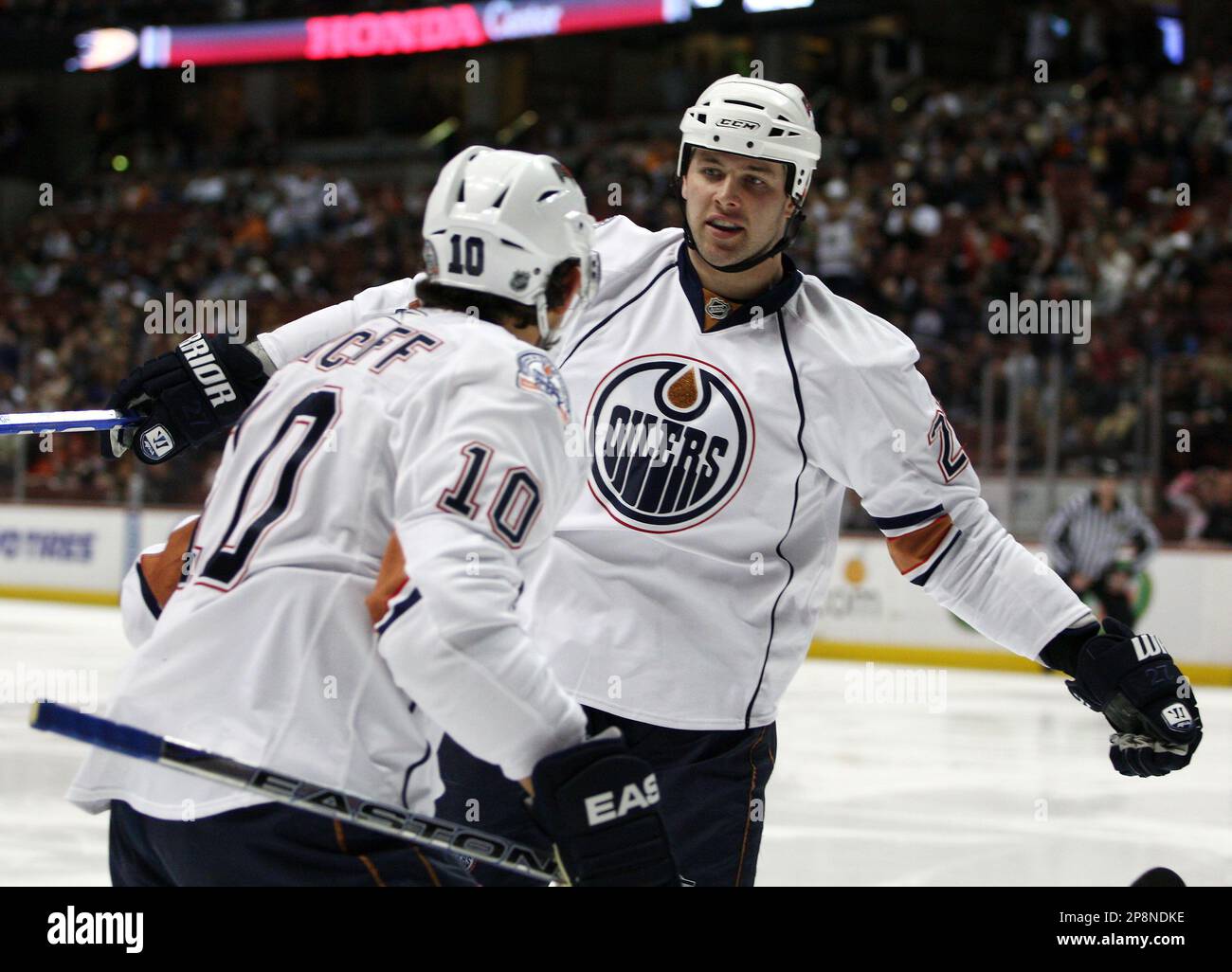 Edmonton Oilers' Dustin Penner, right, is congratulated by Shawn ...