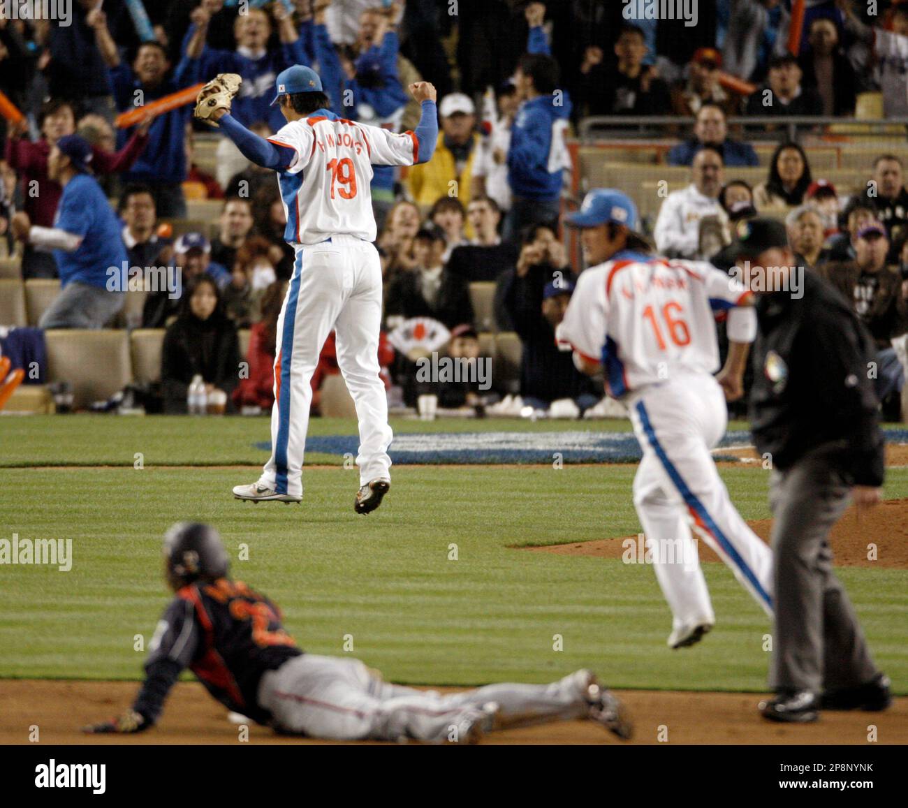 Japan's Norichika Aoki (23) looks up as South Korea pitcher Jong Hyun ...