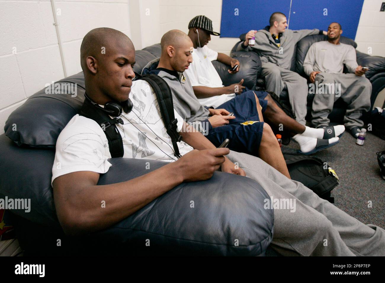 Marquette guard Jimmy Butler, left, relaxes with teammates in the ...