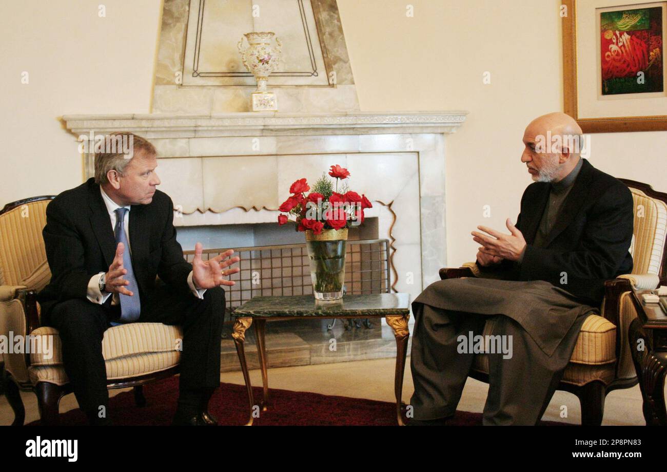 Afghanistan's President Hamid Karzai, right, and NATO's Secretary General Japp De Hoop Sheffer ...