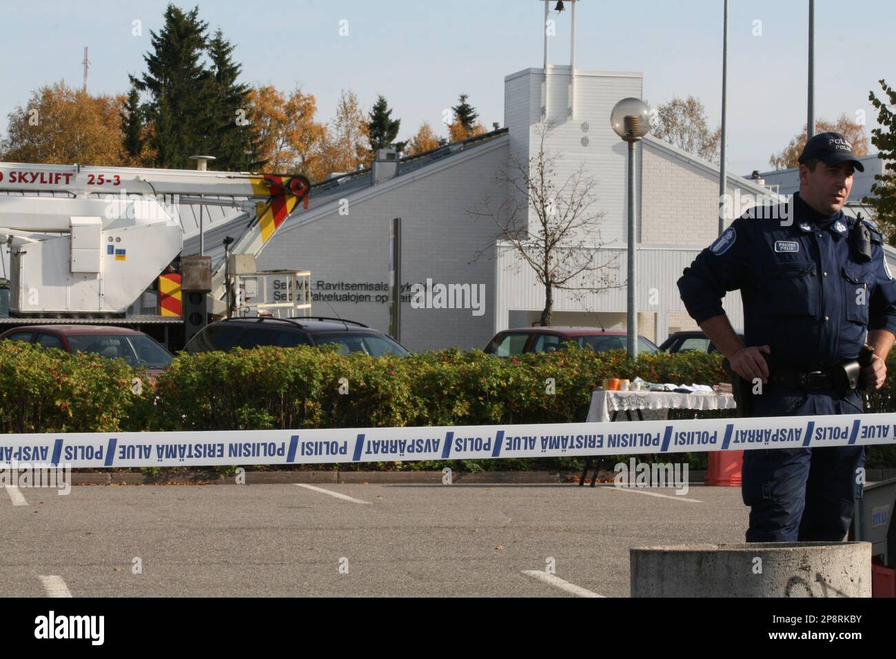 ** FILE ** In this Sept. 23, 2008 file photo a police officer stands in ...
