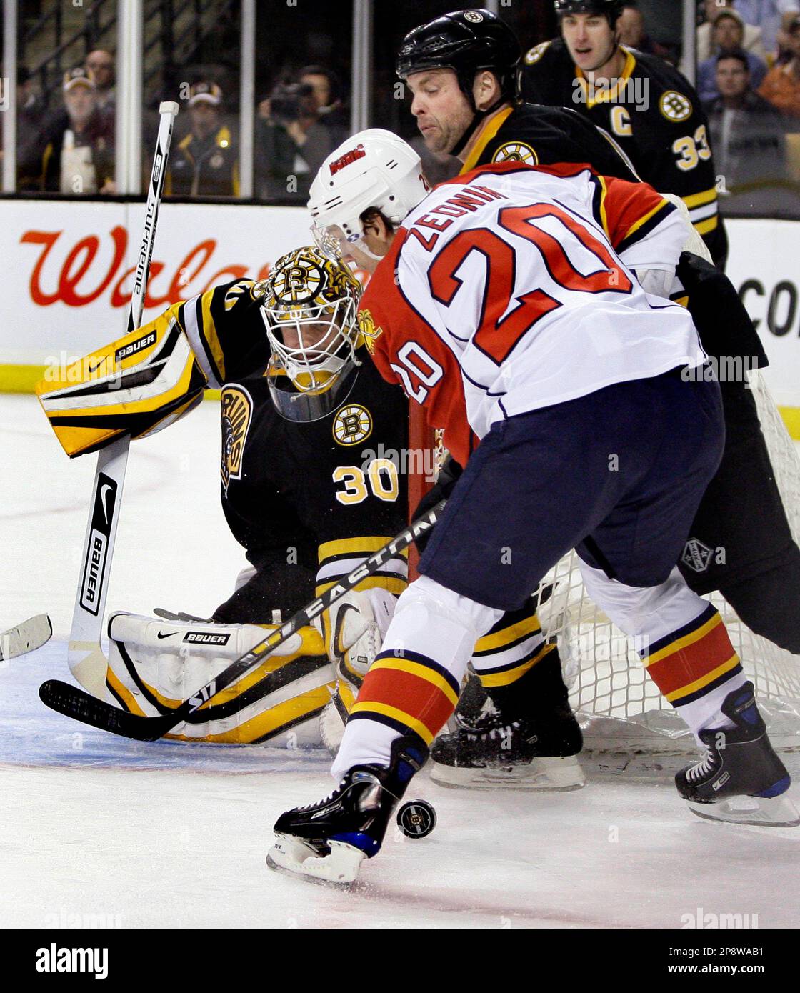 Florida Panthers right wing Richard Zednik (20) tries to get a shot off ...