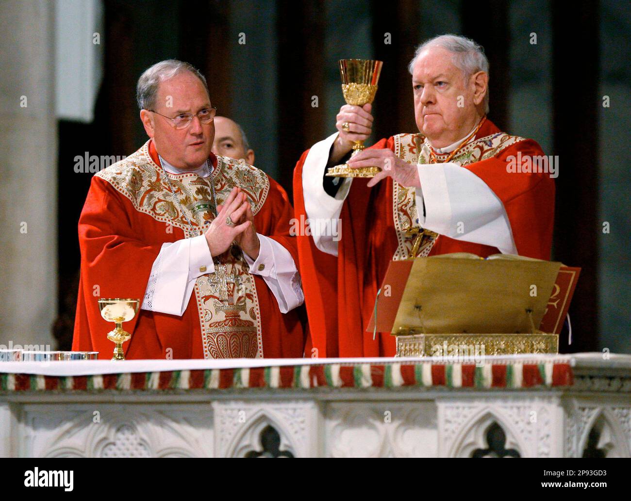Milwaukee Archbishop Timothy M. Dolan, left, and Cardinal Edward Egan ...