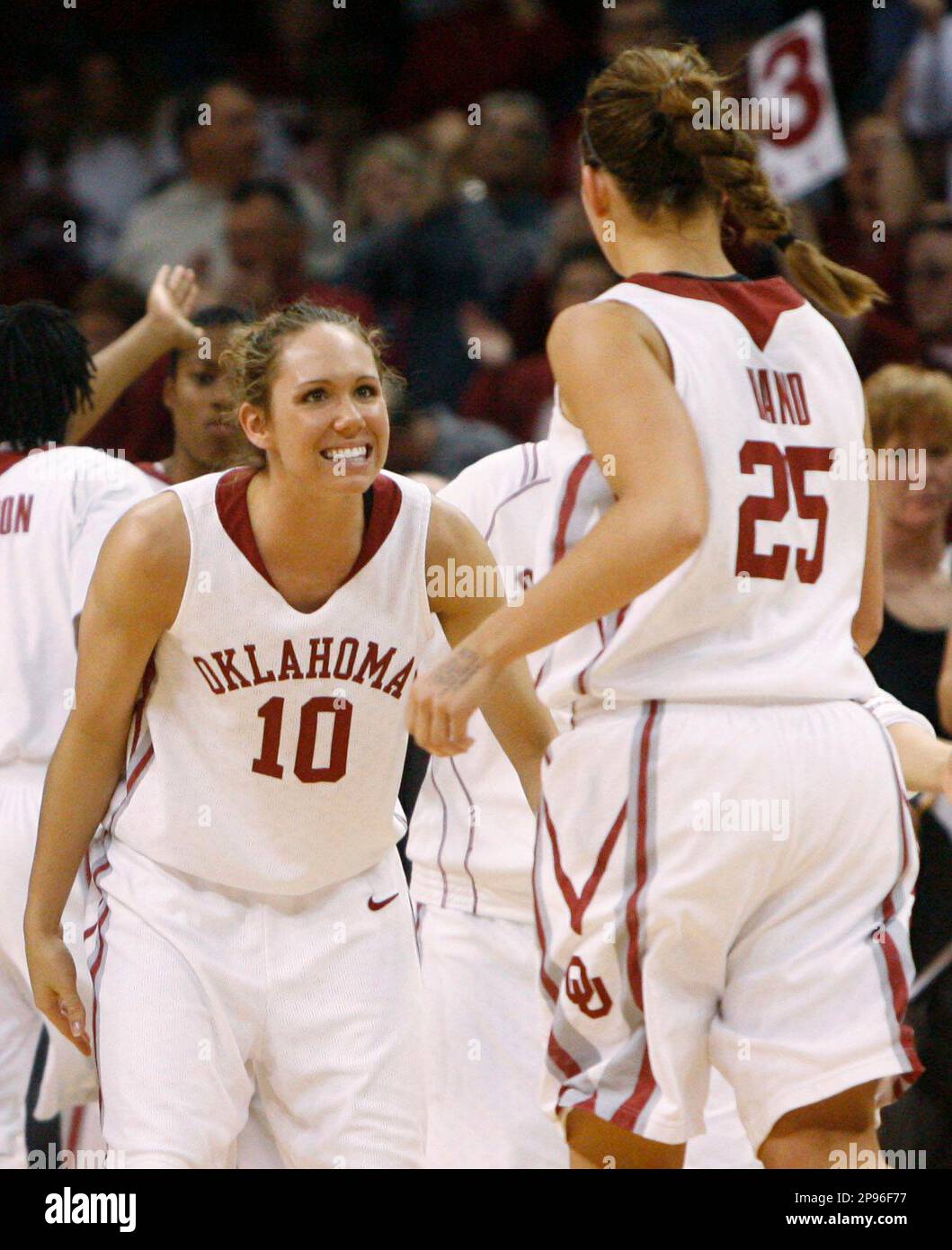 Oklahoma forward Carlee Roethlisberger, left, greets teammate Whitney ...