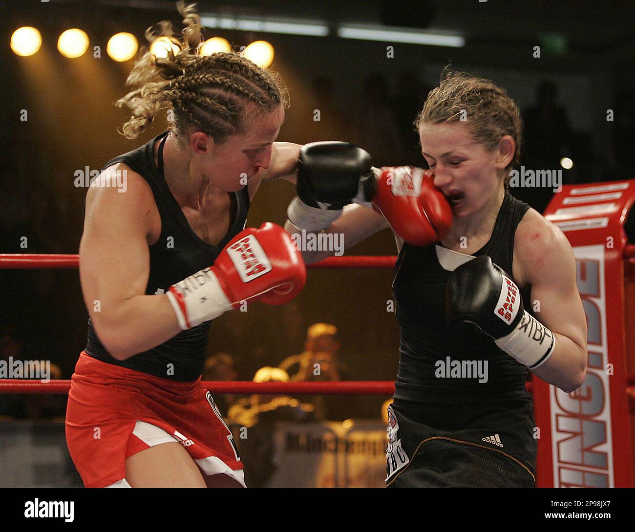 Germany's Ina Menzer, right, fights with Netherlands' Esther Schouten ...