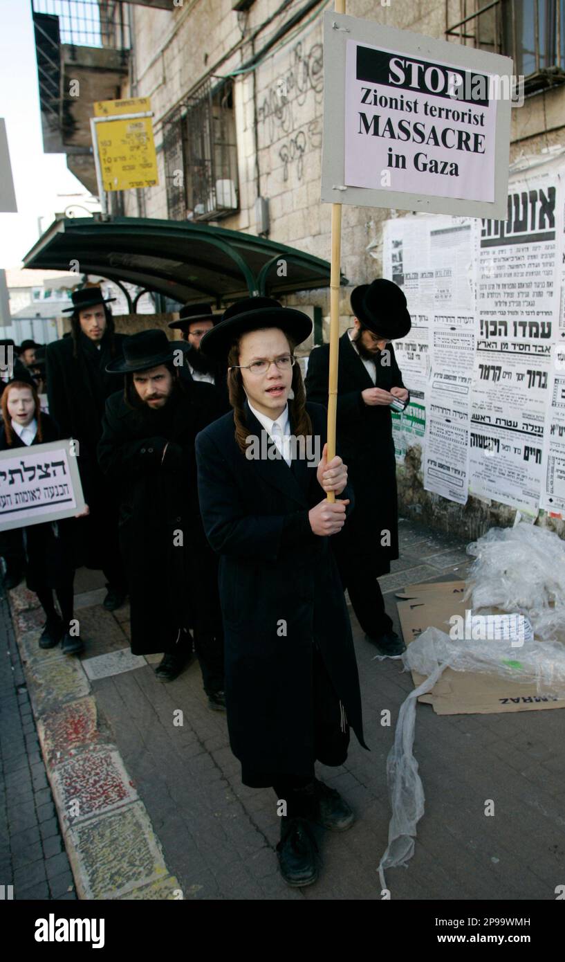 Orthodox Jews from the Naturei Karta group march through the streets of ...