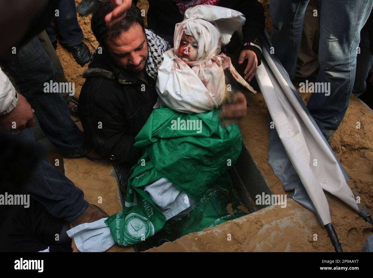 ** EDS NOTE GRAPHIC CONTENT ** The body of one of the children of Hamas ...