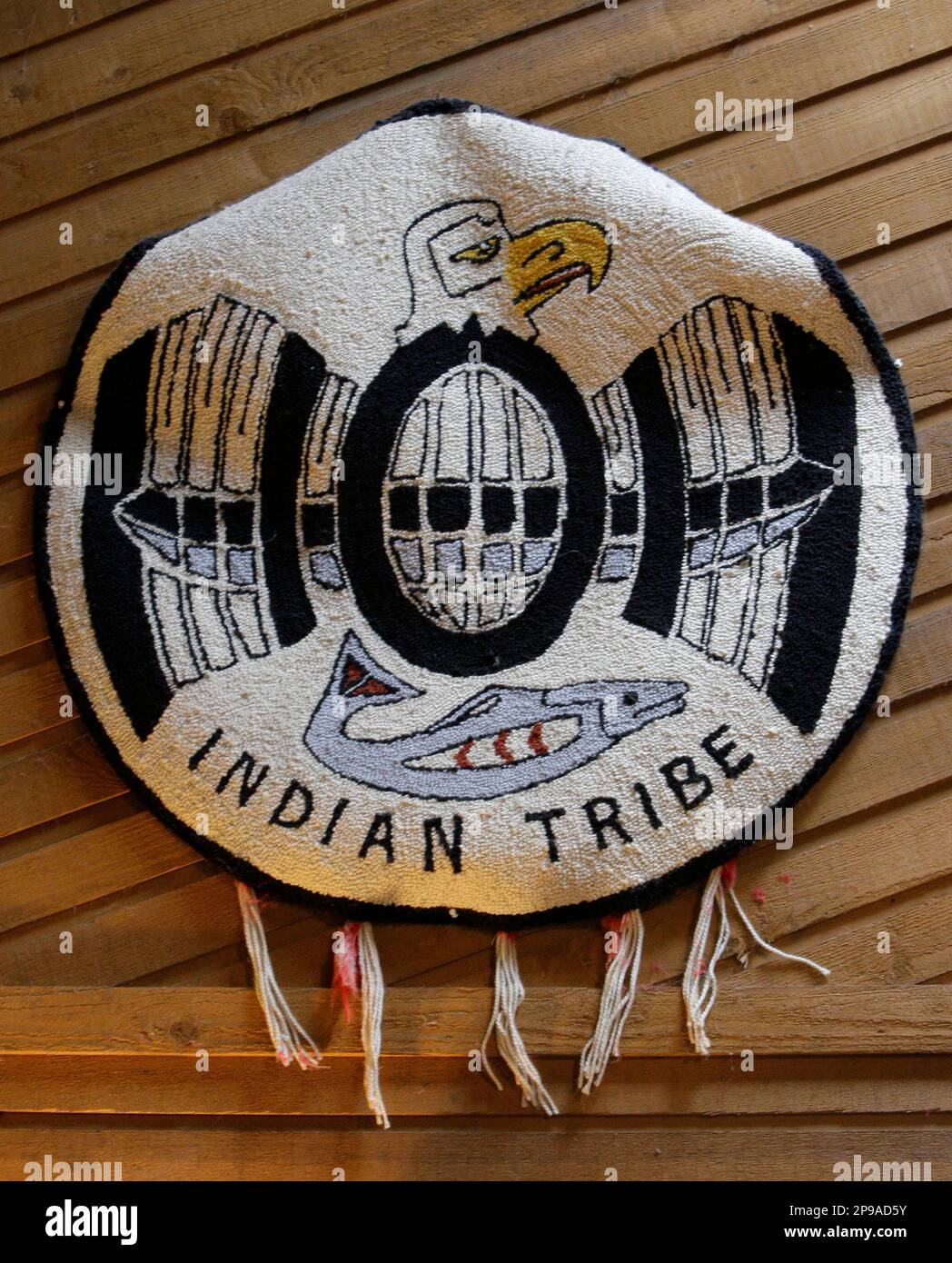 A logo for the Hoh Indian Tribe hangs inside the tribal center on the ...