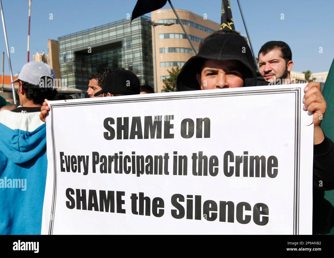 Lebanese protesters, hold a banner, during a demonstration held by ...