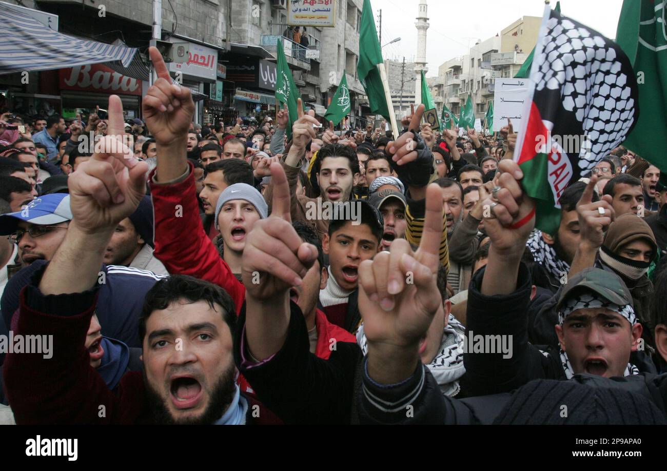 Jordanian protesters shout anti Israeli slogans and wave Arabic and ...