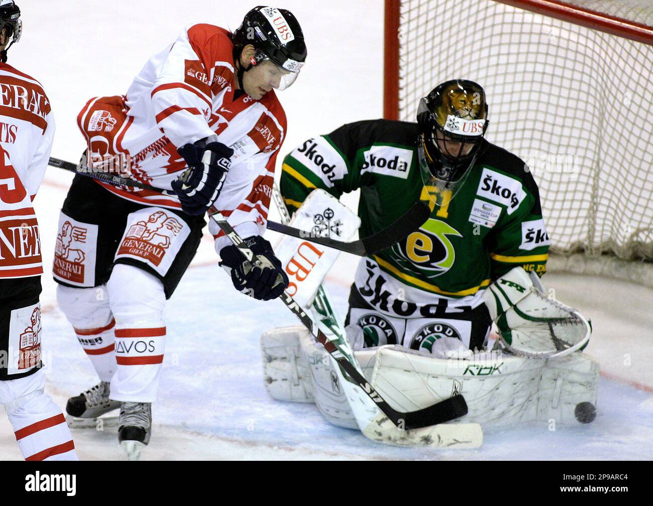 Team Canada's Jean-Guy Trudel, left, confronts with Czech club HC ...