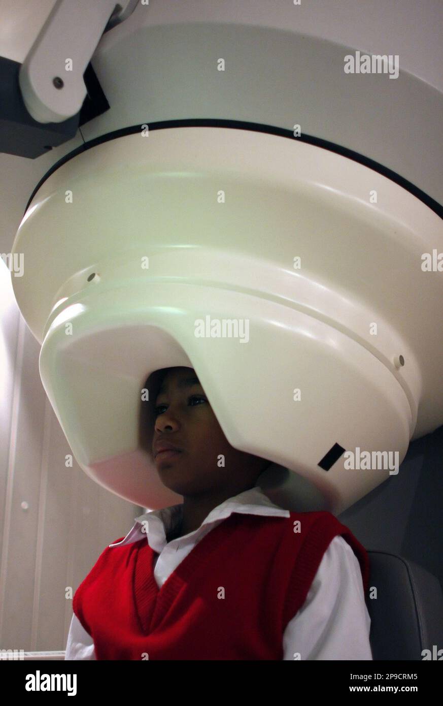 Parker Leiby, an autistic child, demonstrates the use of the ...