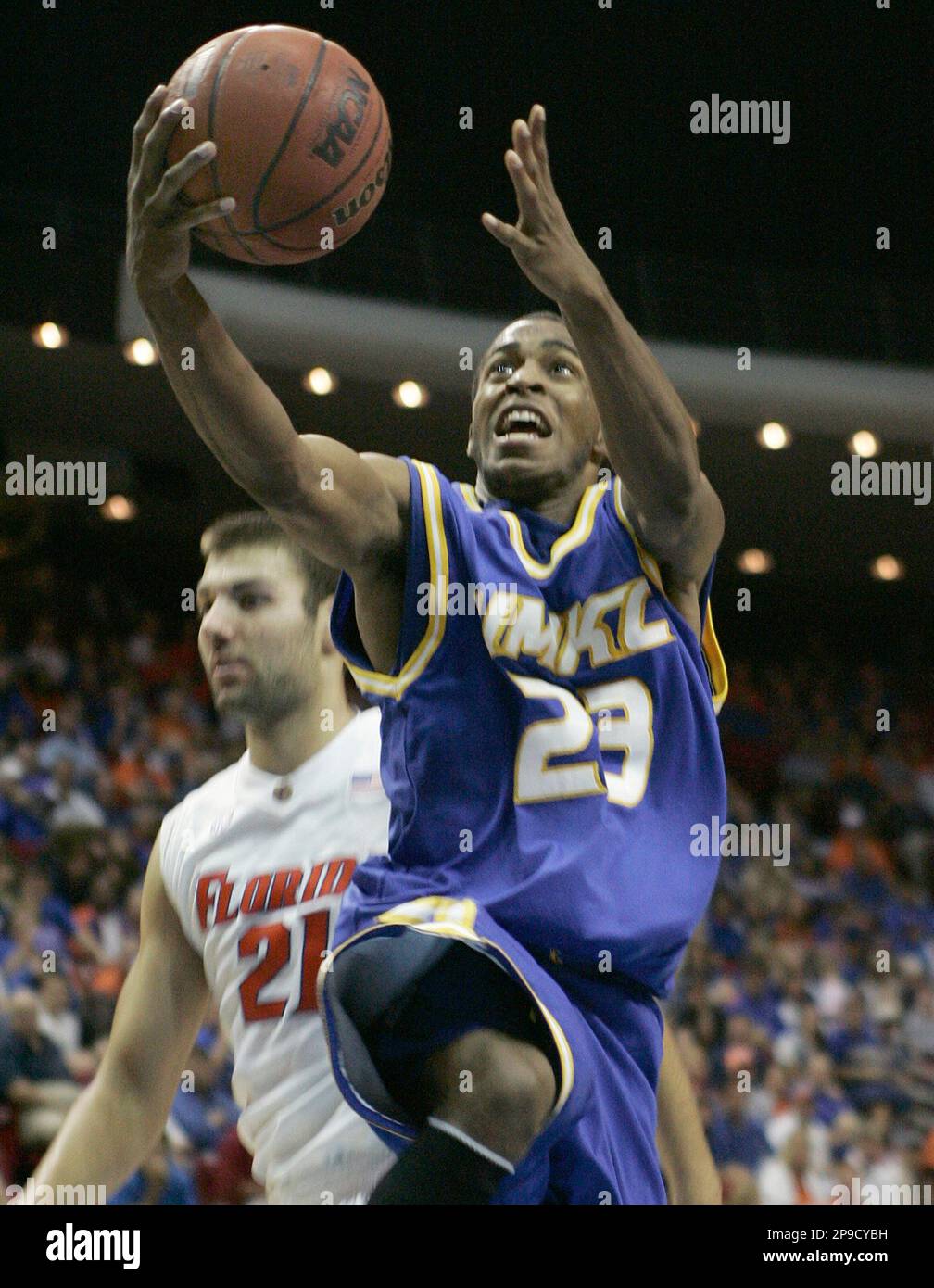 Missouri-Kansas City guard Reggie Hamilton (23) goes up for a basket ...