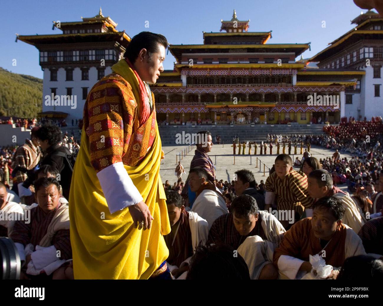 Bhutan's 5th King Jigme Khesar Namgyal Wangchuk, center, walks in the ...