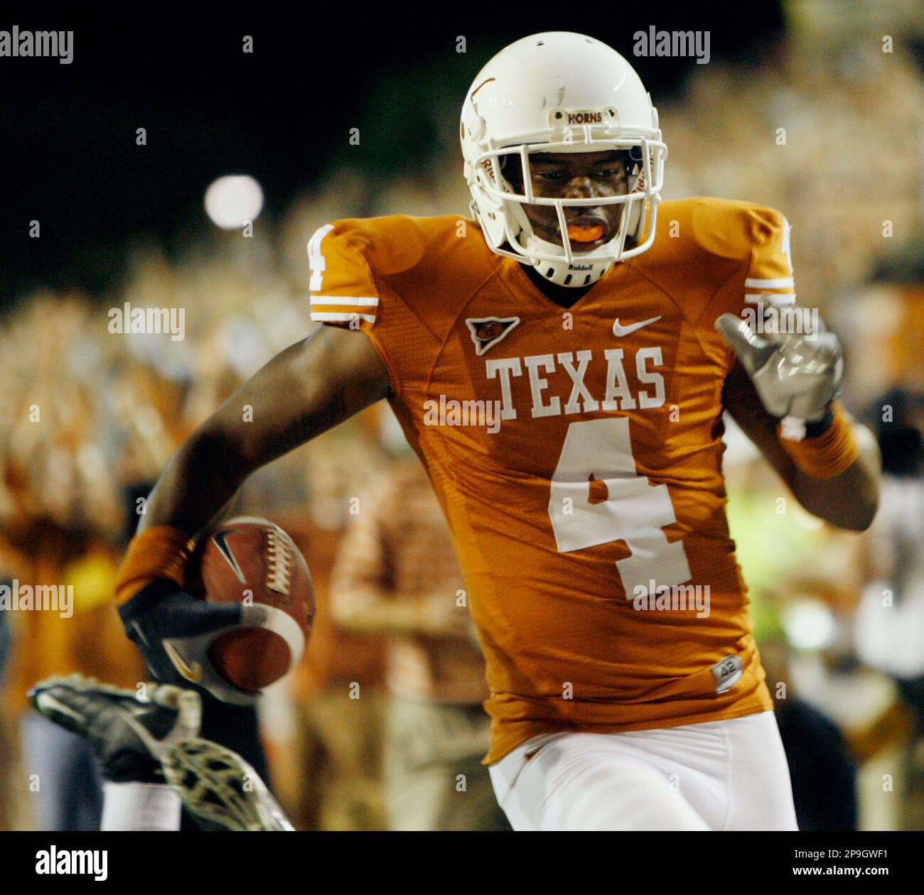 Texas freshman wide receiver Dan Buckner outdistances a defender as he ...