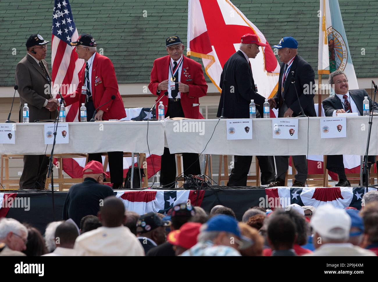 A number of Tuskegee Airmen are pictured at the end of a question and ...