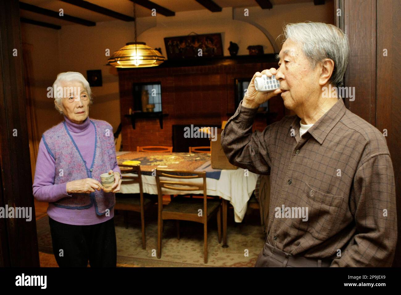 University of Chicago Physics professor Yoichiro Nambu, right, talks on ...