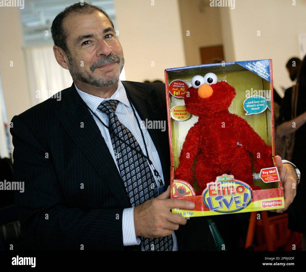Neil Friedman, President, Mattel Brands, poses for a portrait with Elmo ...
