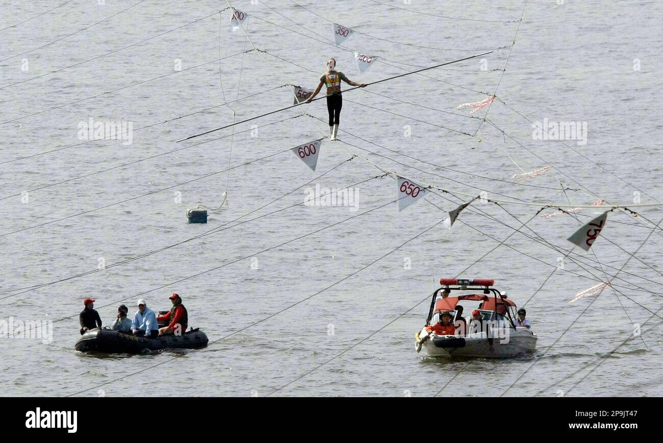 Russia's Valery Svezhov walks a high wire during the World High Wire ...