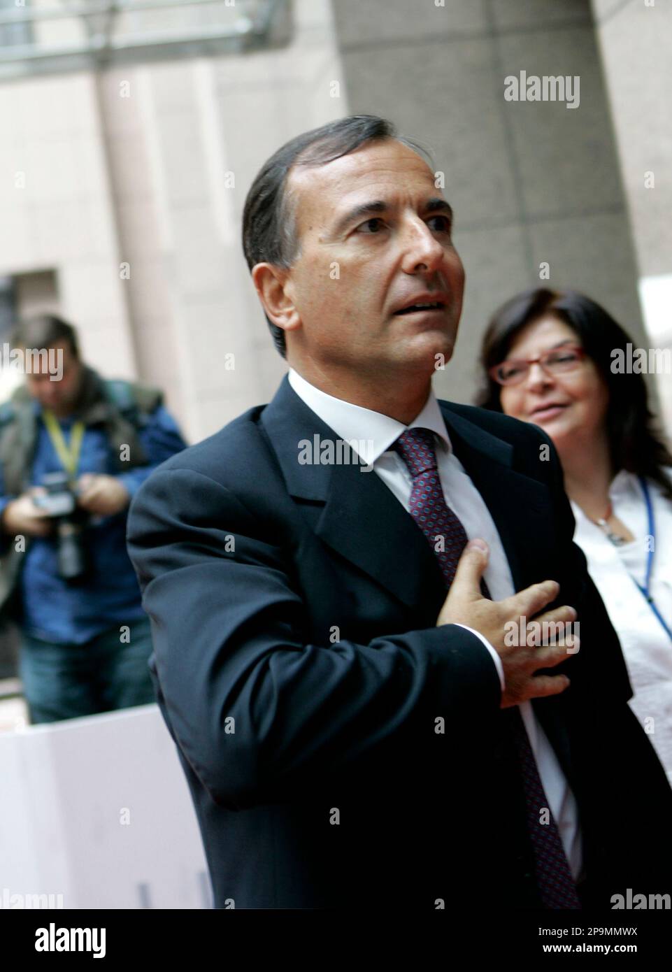Italian Foreign Minister Franco Frattini speaks with the media as he ...