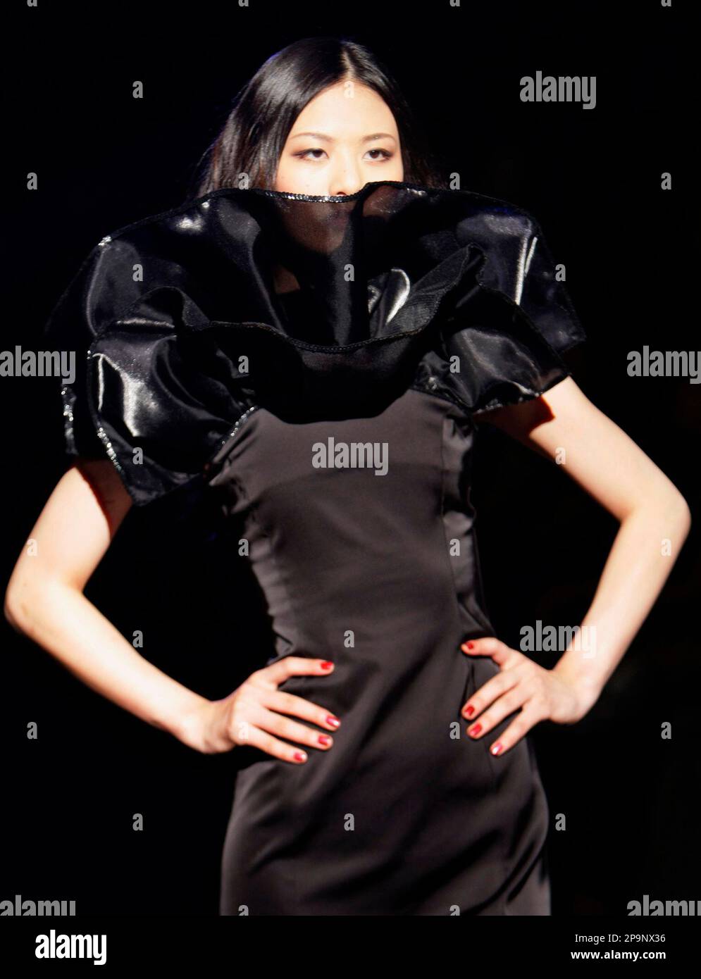 A model displays creations by Japanese designer Masahiko Saito at 2009 ...