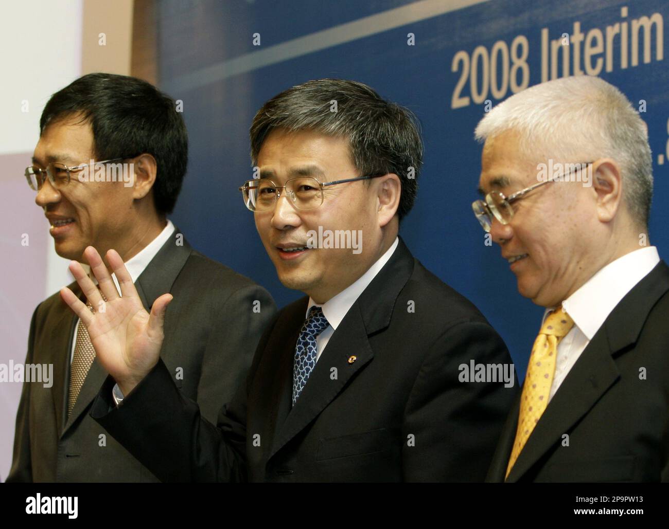 China Construction Bank Vice President Fan Yifei, left, Chairman Guo ...