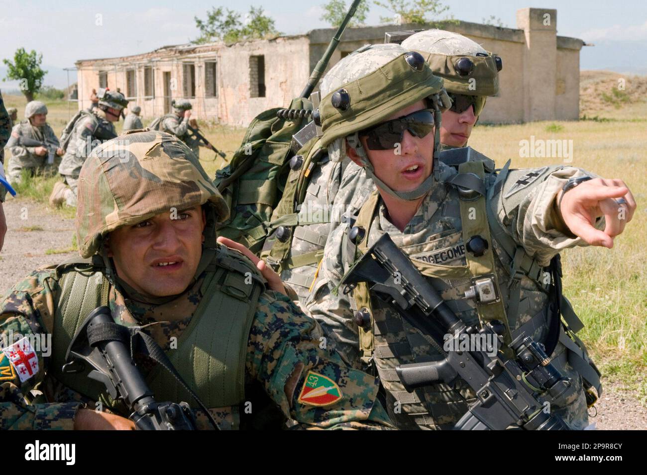 In this July 18, 2008 file photo, Georgian and U.S. servicemen are seen ...