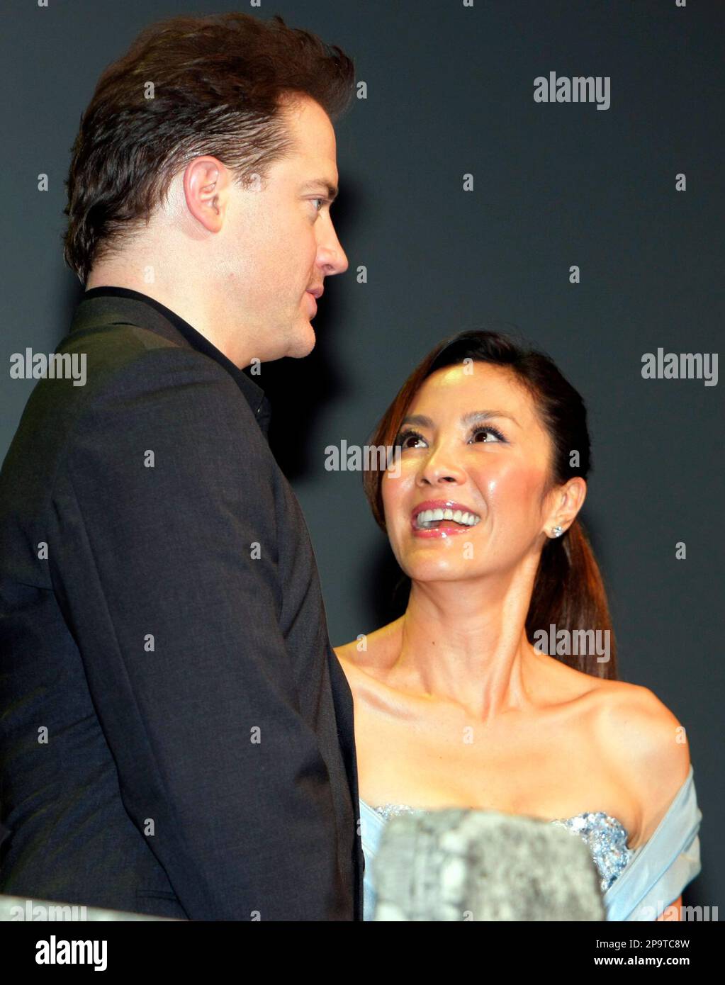 Actor Brendan Fraser, left, and Actress Michelle Yeoh chat during their ...
