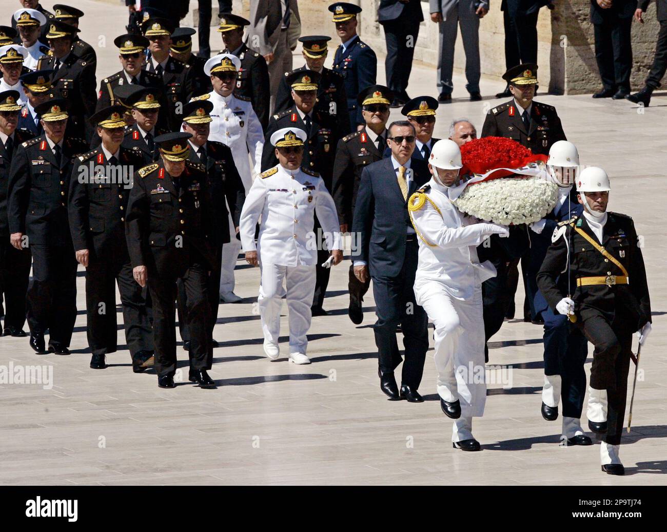 Turkish Prime Minister Recep Tayyip Erdogan, in suit, with glasses ...
