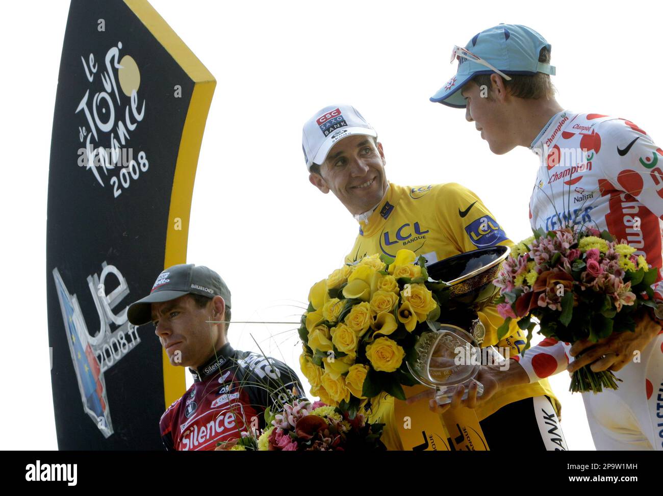 Tour de France winner Carlos Sastre of Spain, center, runner-up Cadel ...