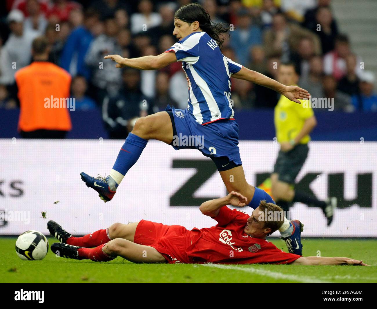 Marko Pantelic of Berlin, top, challenges for the ball against Stephen ...