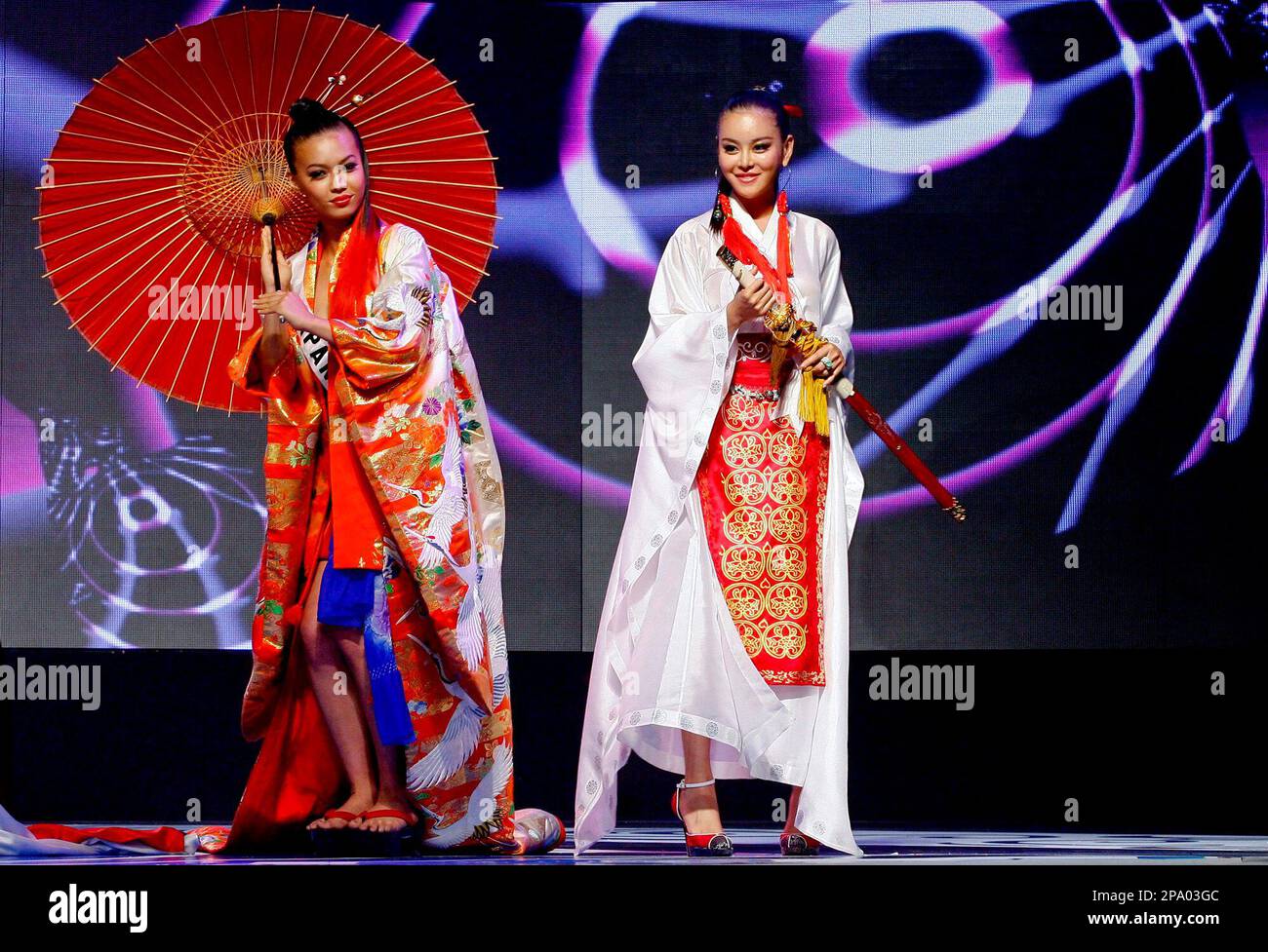 Miss Japan Hiroko Mima, left, and Miss Korea Sun Lee, right, with ...