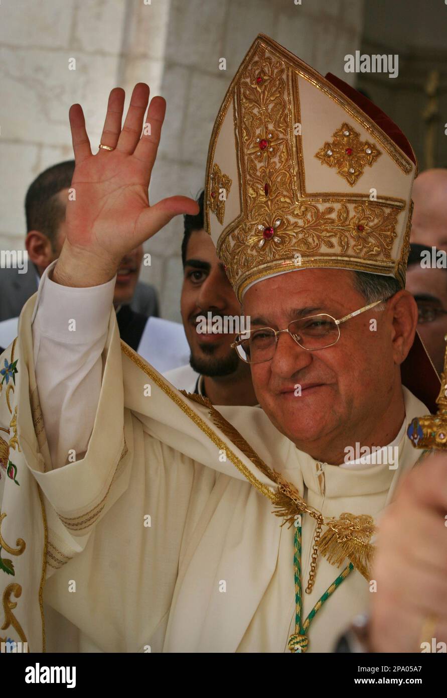 Newly appointed Latin Patriarch in Jerusalem Fouad Twal waves during a ...