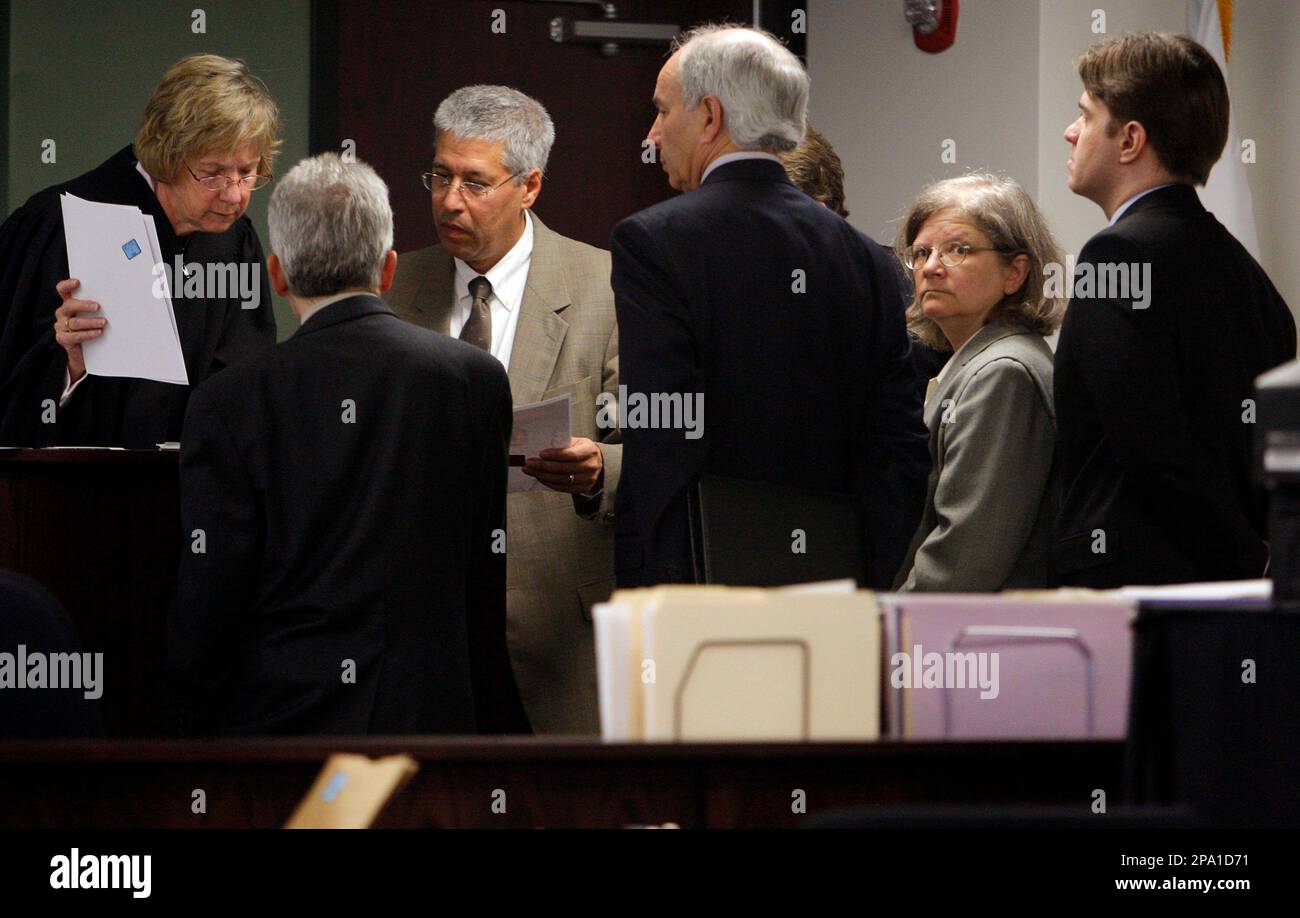 Neil Entwistle, far right, listens to a conference between Judge Diane ...