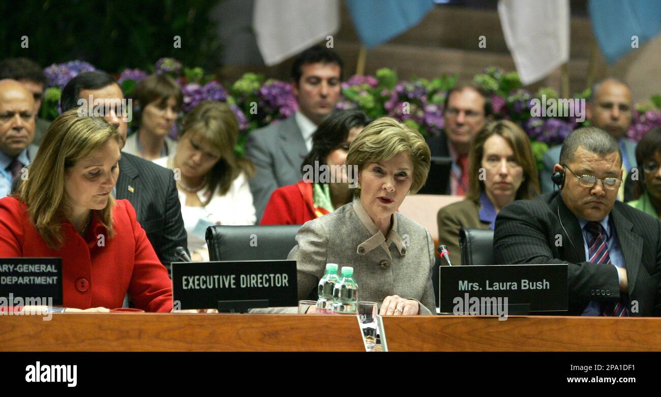 U.S. first lady Laura Bush, flanked at left by United Nations World ...