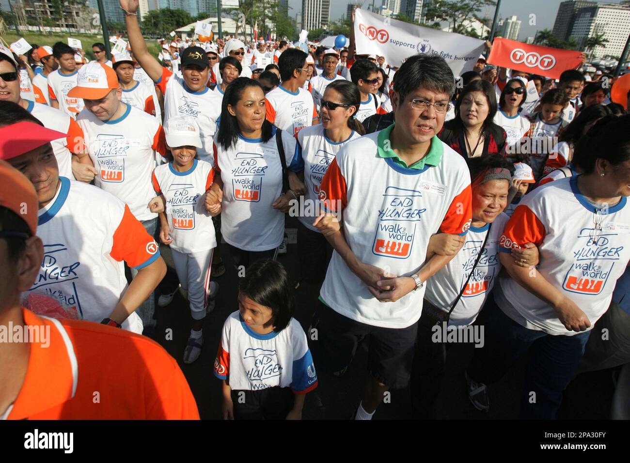 Philippine Senator Francisco Pangilinan, 3rd from right, and Valerie Guarneri, 5th from left ...