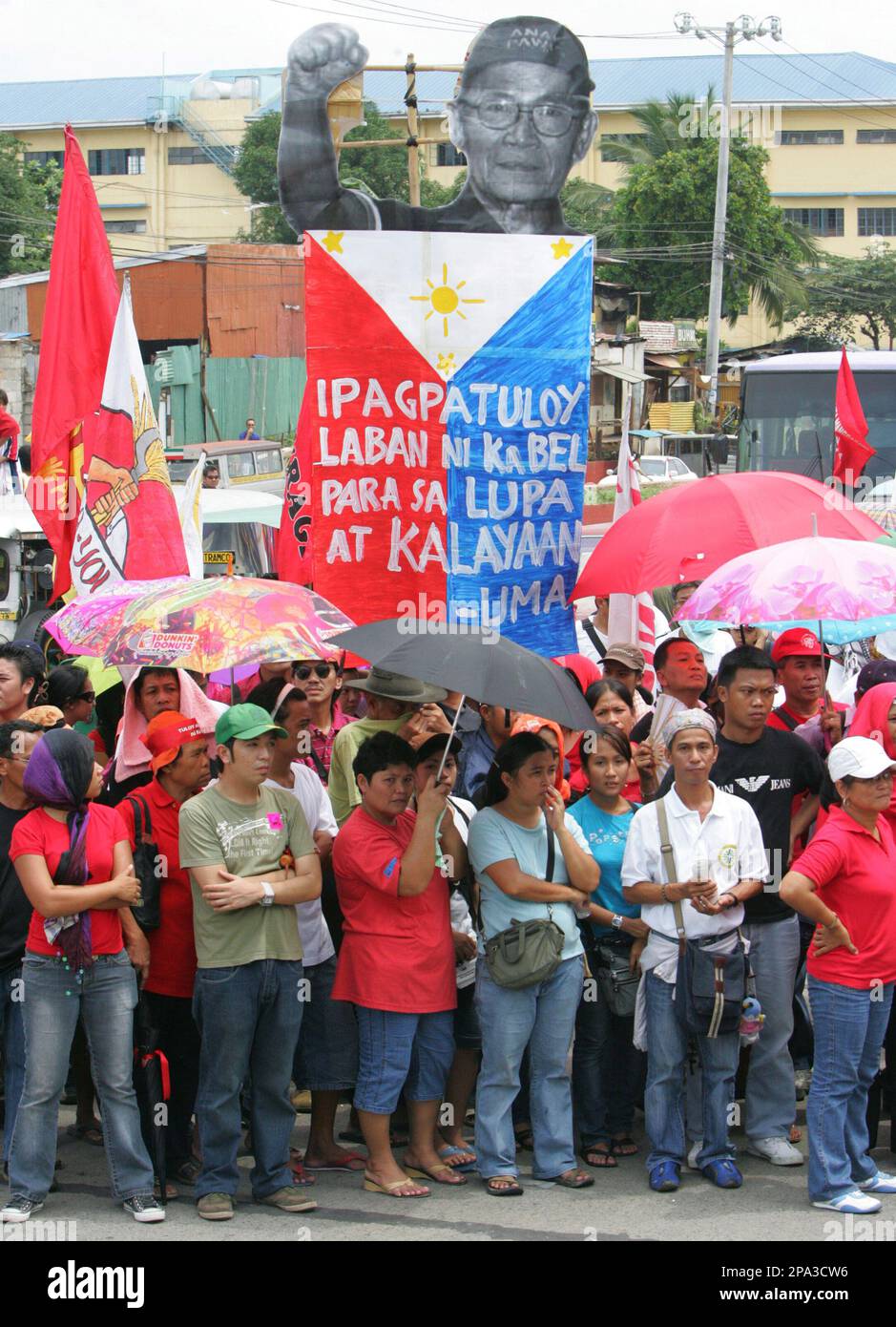 Supporters of leftist Congressman Crispin Beltran line the streets as ...