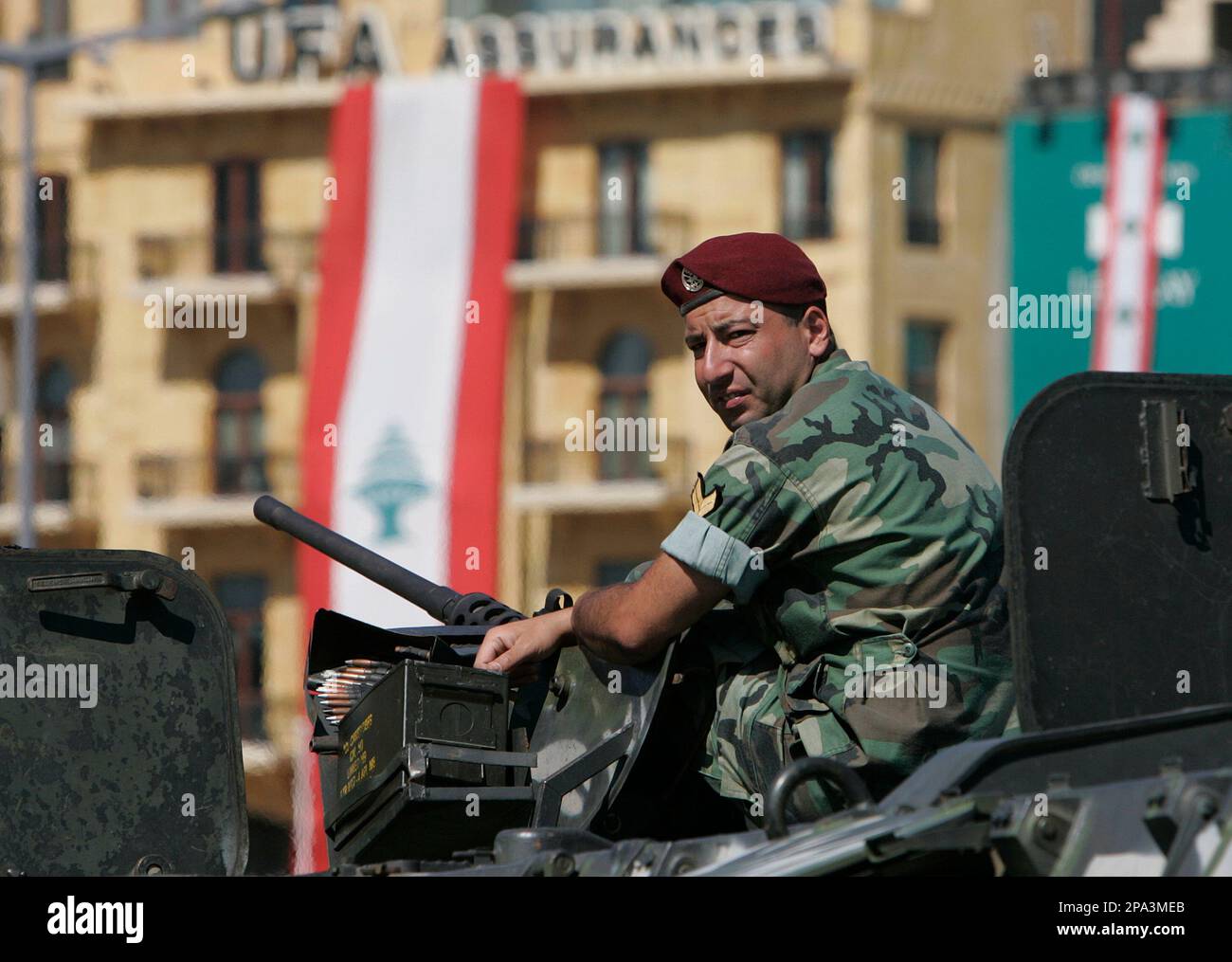 A Lebanese soldier from the special forces army units, sits on his ...