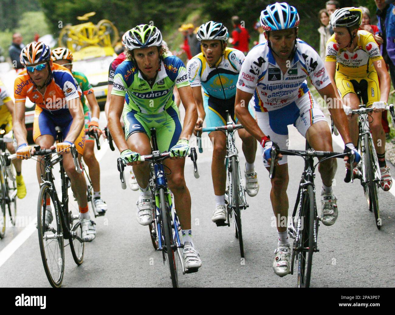From left: Spain's Denis Menchov, Italy's Fausto Pellizotti, Spain's ...