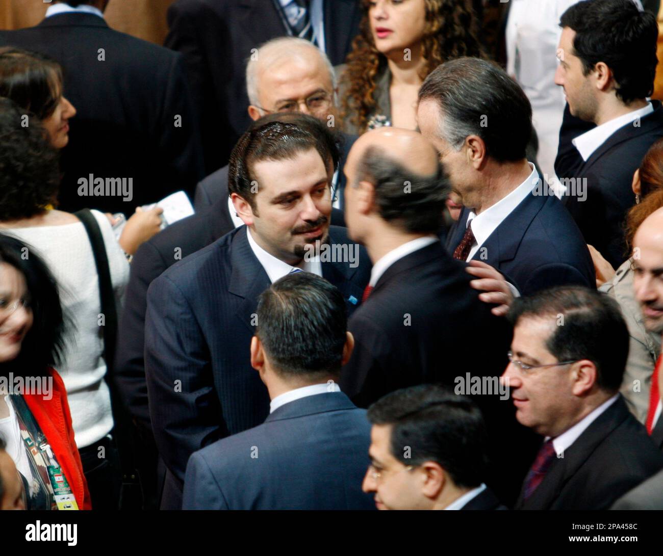 Samir Geagea, hardline Christian pro-governmen, his back to camera ...