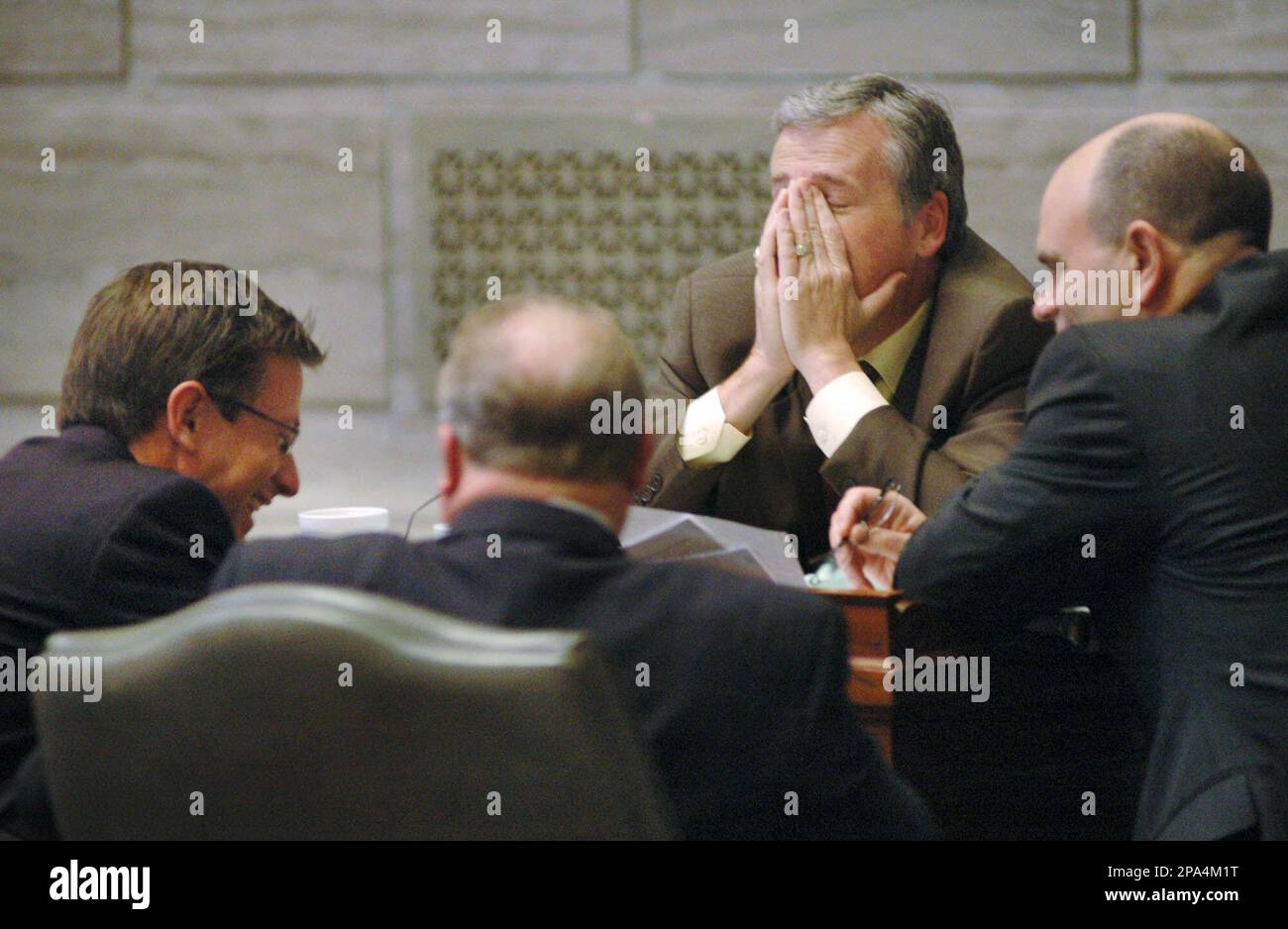 Senators relax after returning from a long night of debate, Friday, May ...